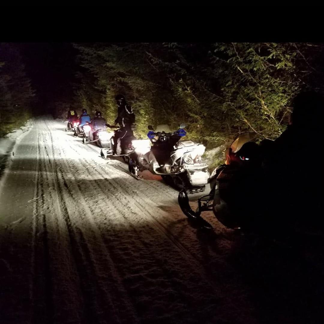 Snowmobiling – Cozy Cove Cabins